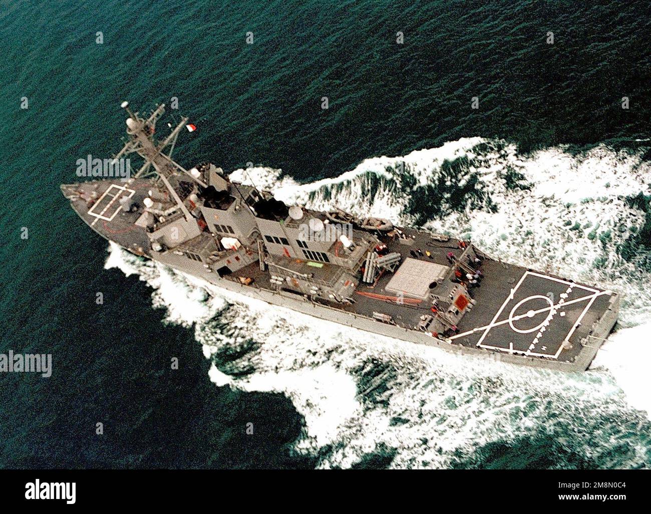 The guided missile destroyer USS JOHN S. MCCAIN (DDG 56) patrols the ...