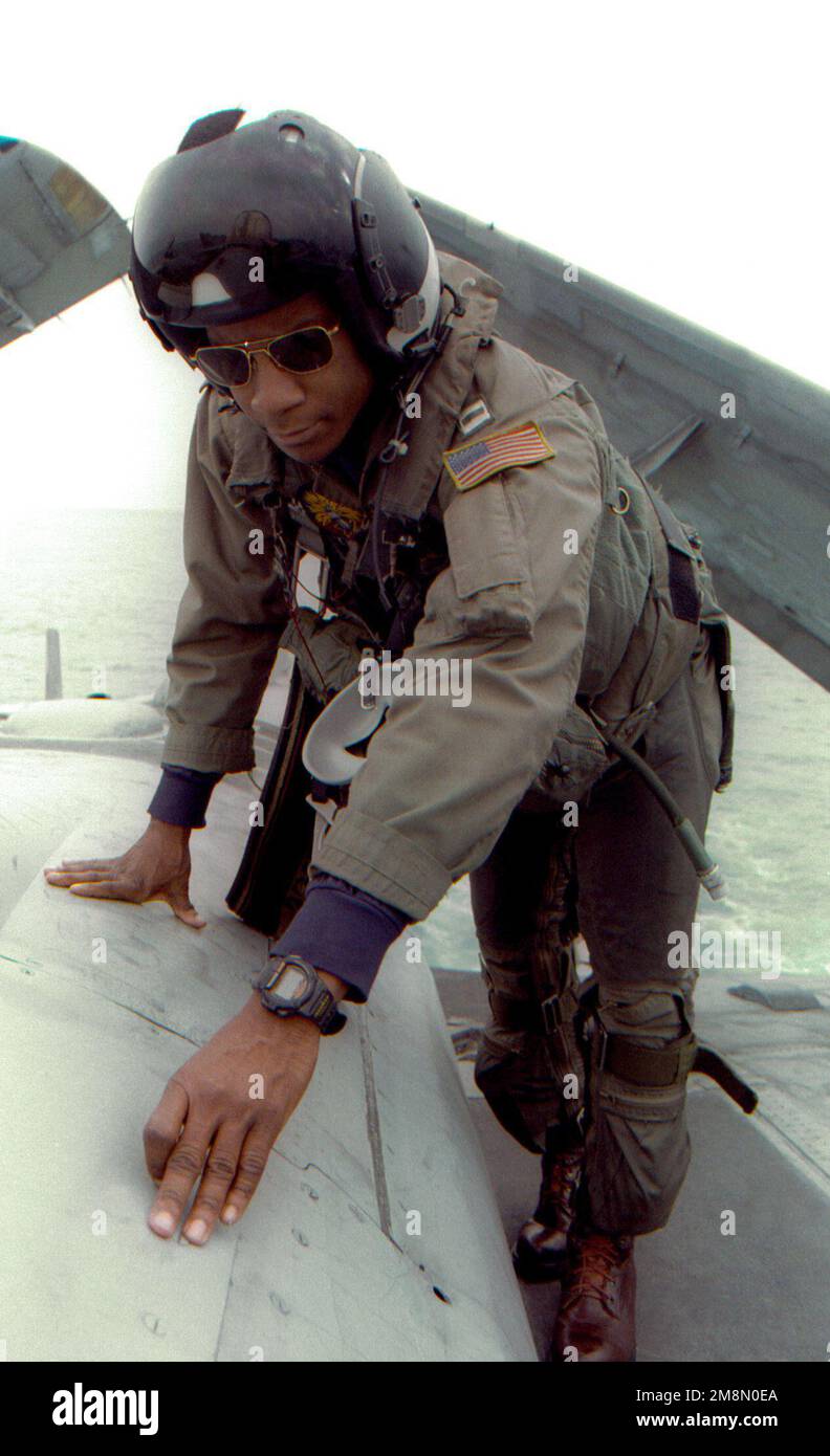 LT Cedric Walker completes preflight checks on his EA-6B Prowler aboard ...