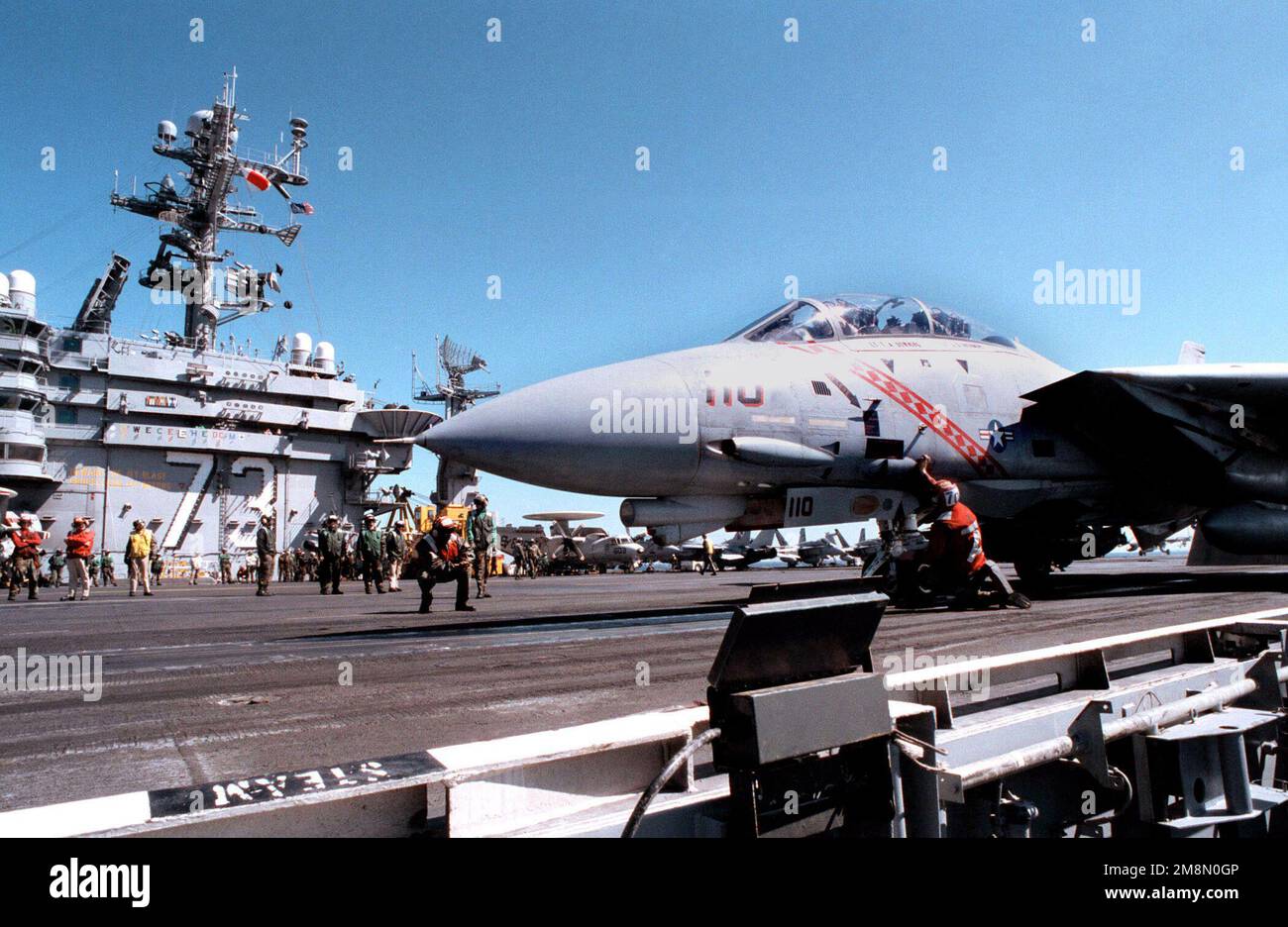 An F-14B Tomcat attached to Fighter Squadron One Zero Two (VF-102) prepares to launch from the ...
