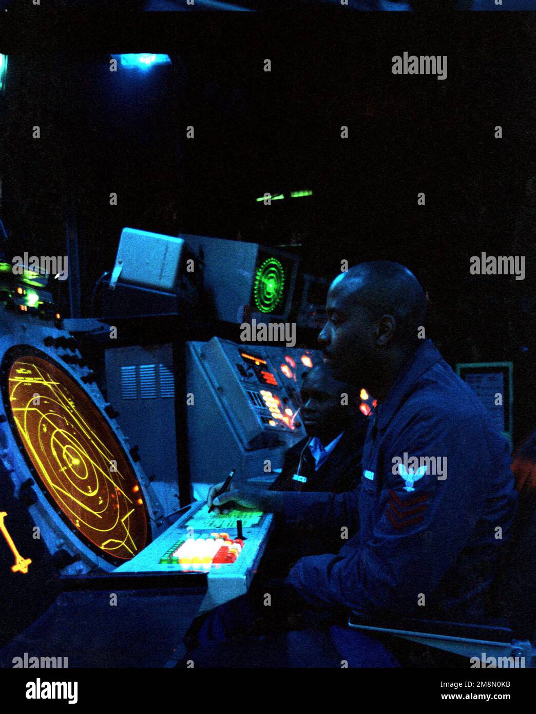 Air Traffic Controller 1ST Class Charles Landers monitors aircraft ...