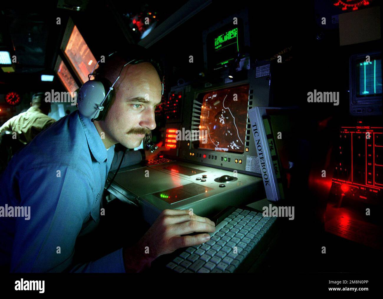 Operation SPECIALIST 2nd Class Gilbert Lundgren operates radar ...