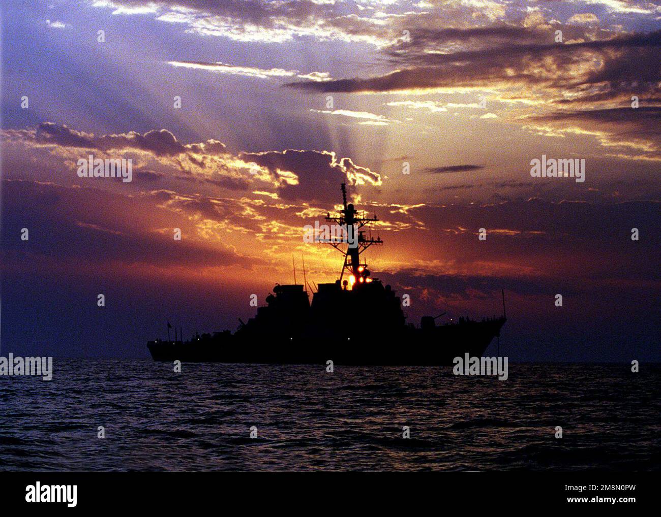 The guided missile destroyer USS CARNEY (DDG 64) patrols the waters of ...