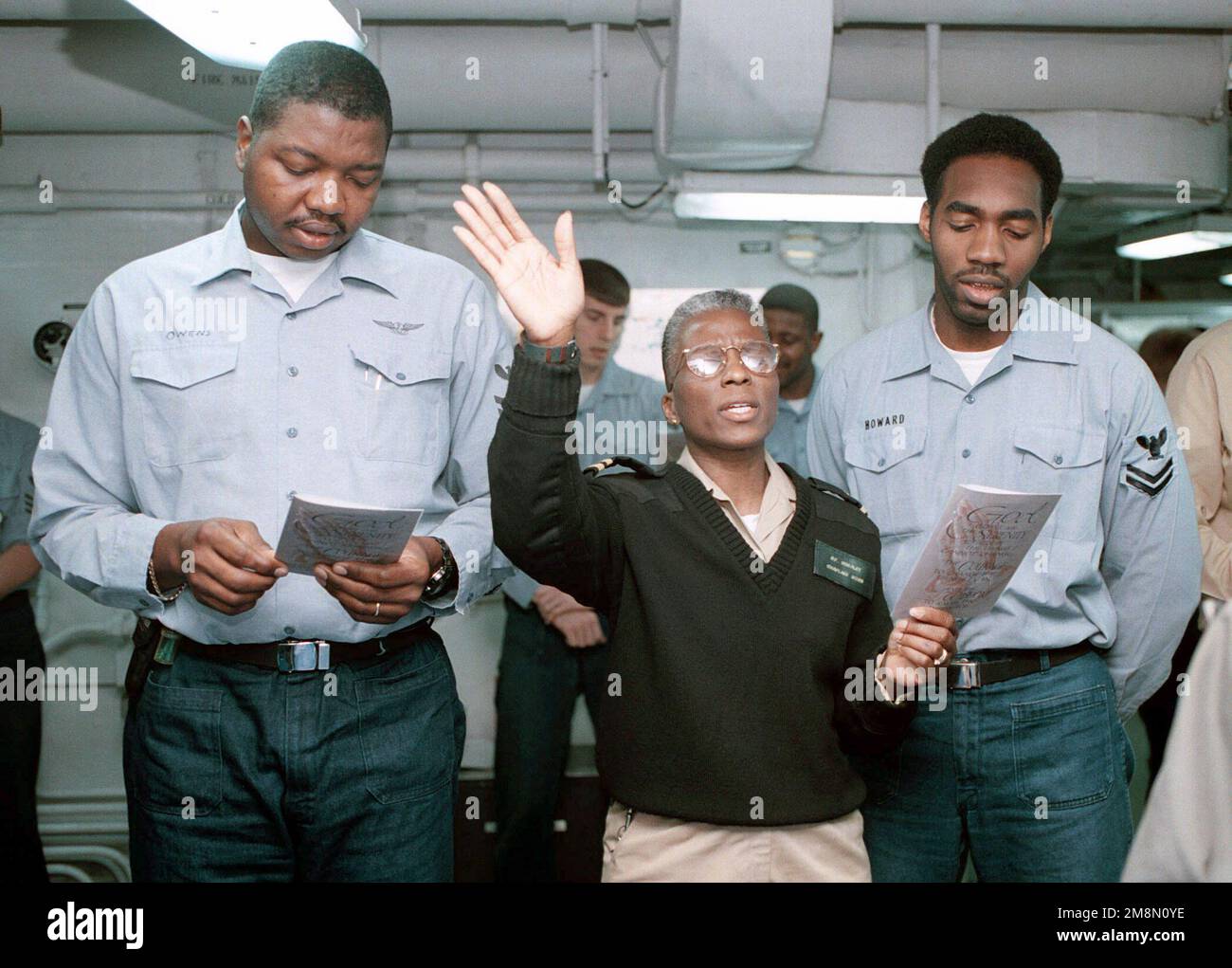 US Navy Radioman 1ST Class (RM1) Anthony Owens (left), Lieutenant ...