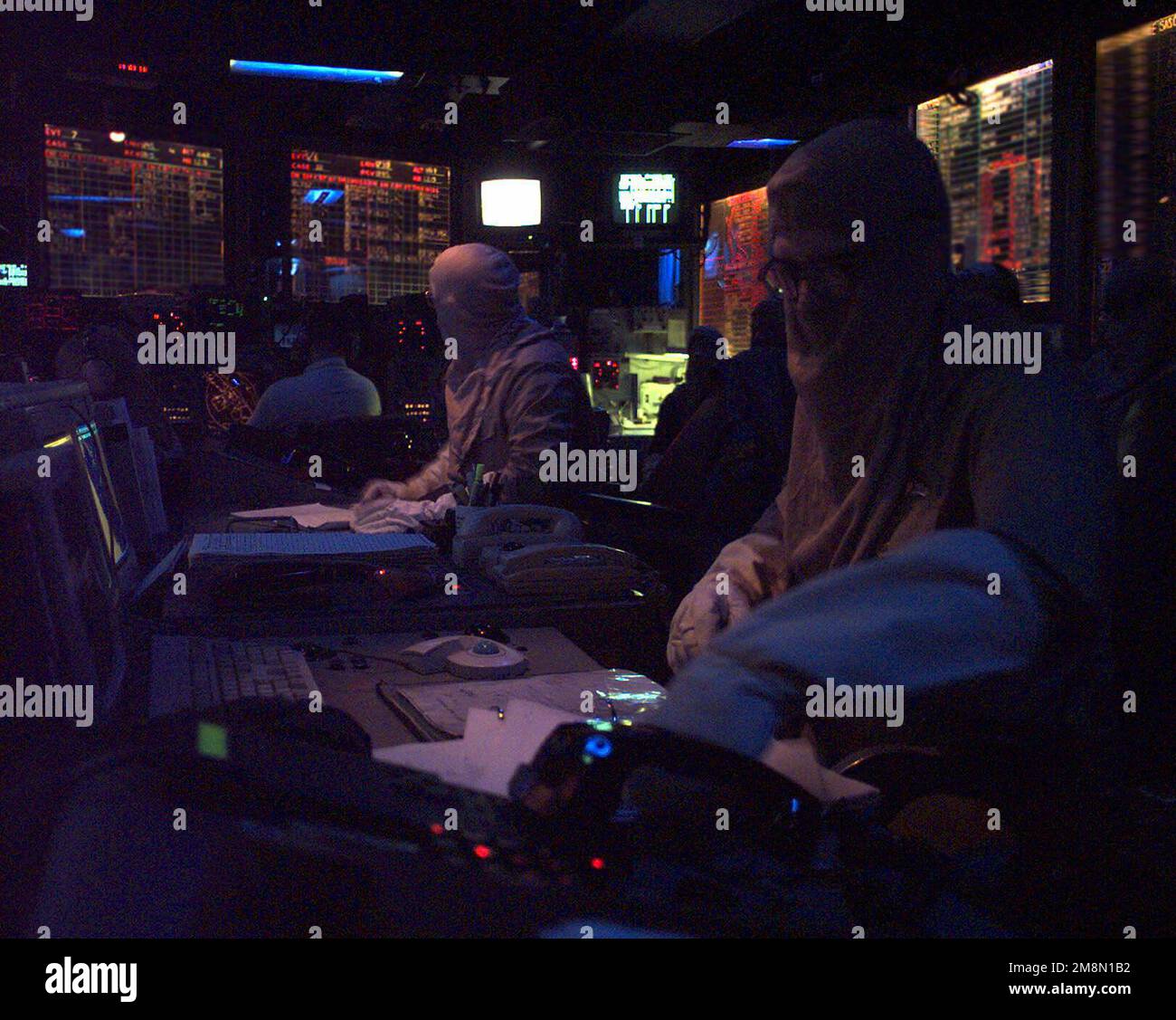 US Navy Lieutenant Bill Lucas (Foreground) readies for a General ...