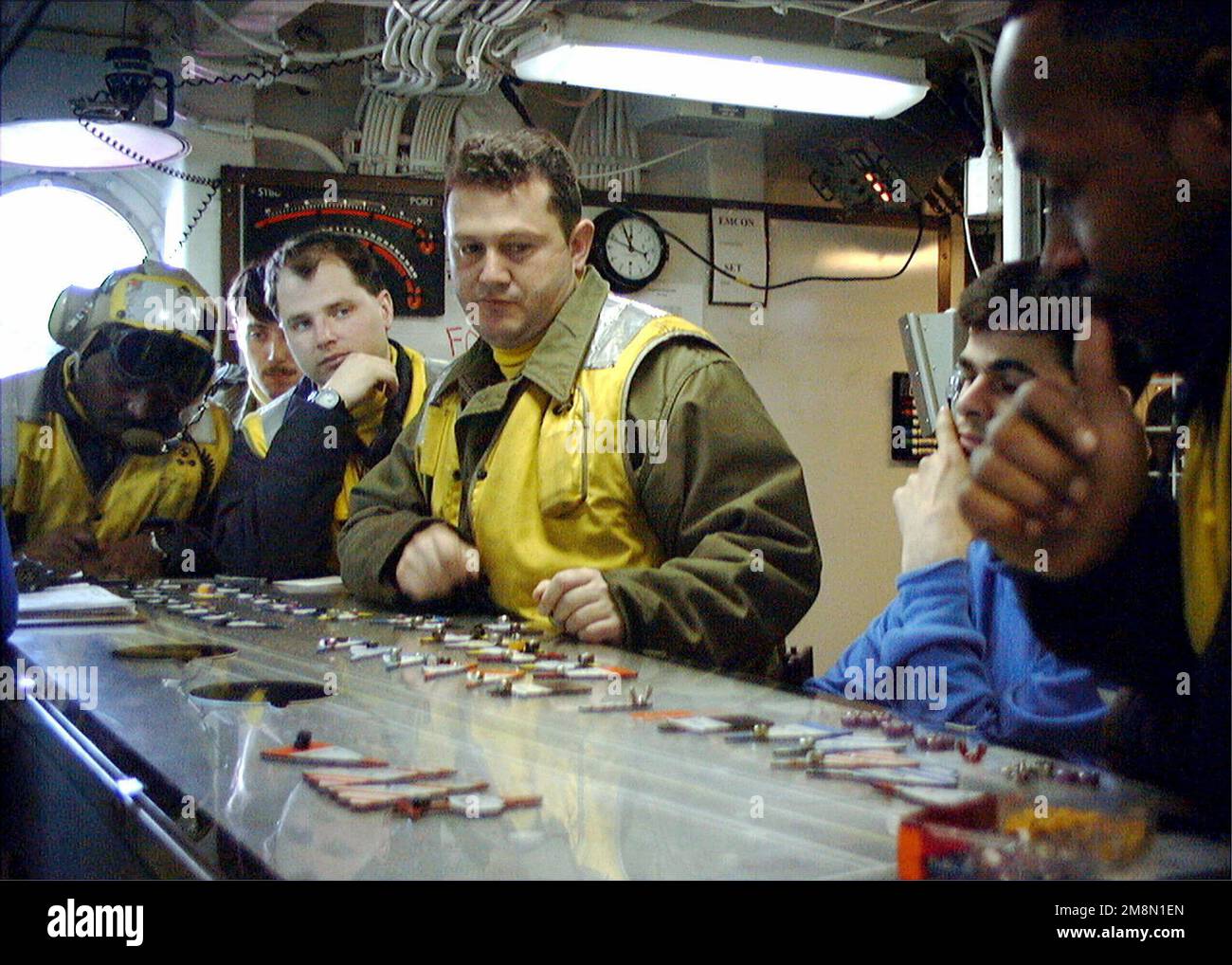 US Navy Aviation Boatswain's Mate CHIEF William Claye (center ...