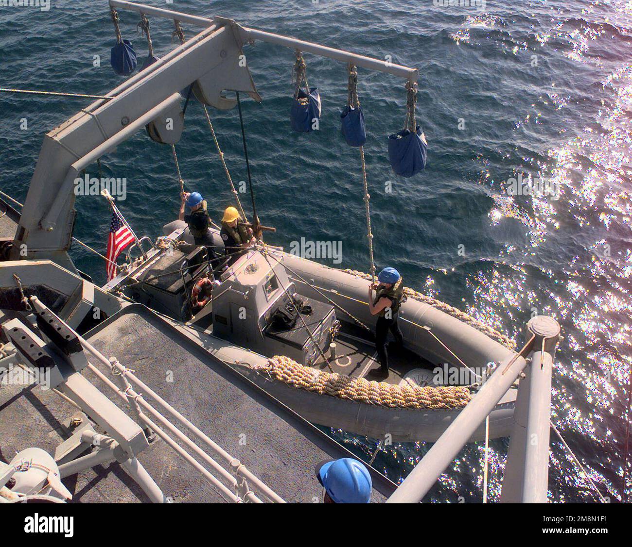 Sailors from USS SAMUEL B. ROBERTS (FFG-58) prepare to leave the ship ...