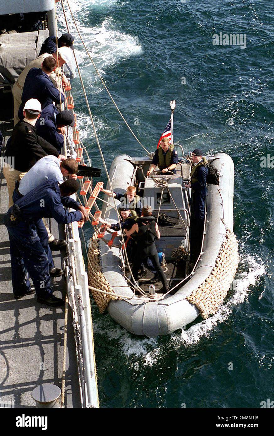 Sailors from USS SAMUEL B. ROBERTS (FFG-58) prepare to leave the ship ...
