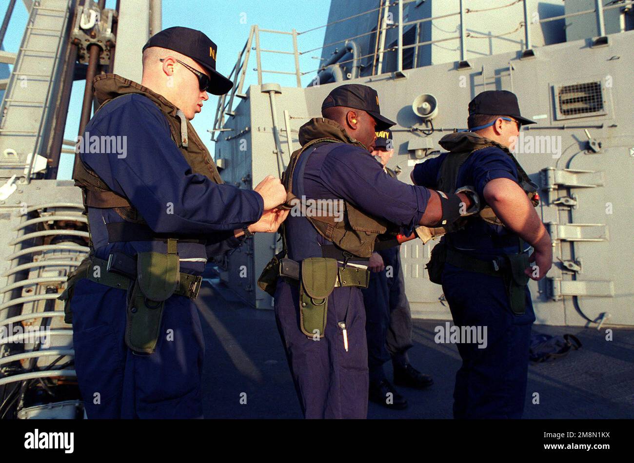 Onboard USS JOHN S. MC CAIN (DDG-56) Boarding security team members ...
