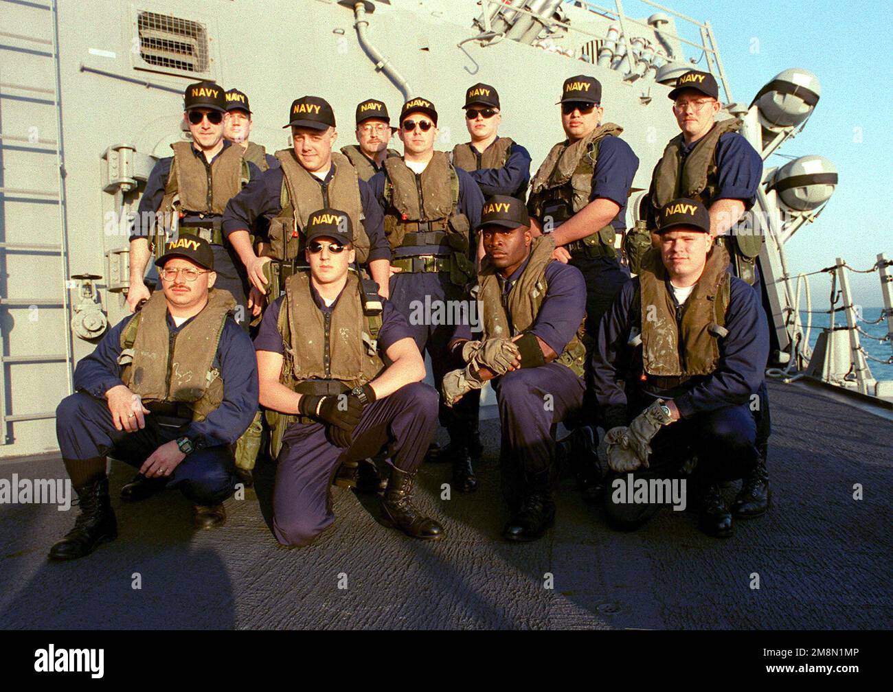The USS JOHN S. MC CAIN (DDG-56) boarding team members dressed-out ...
