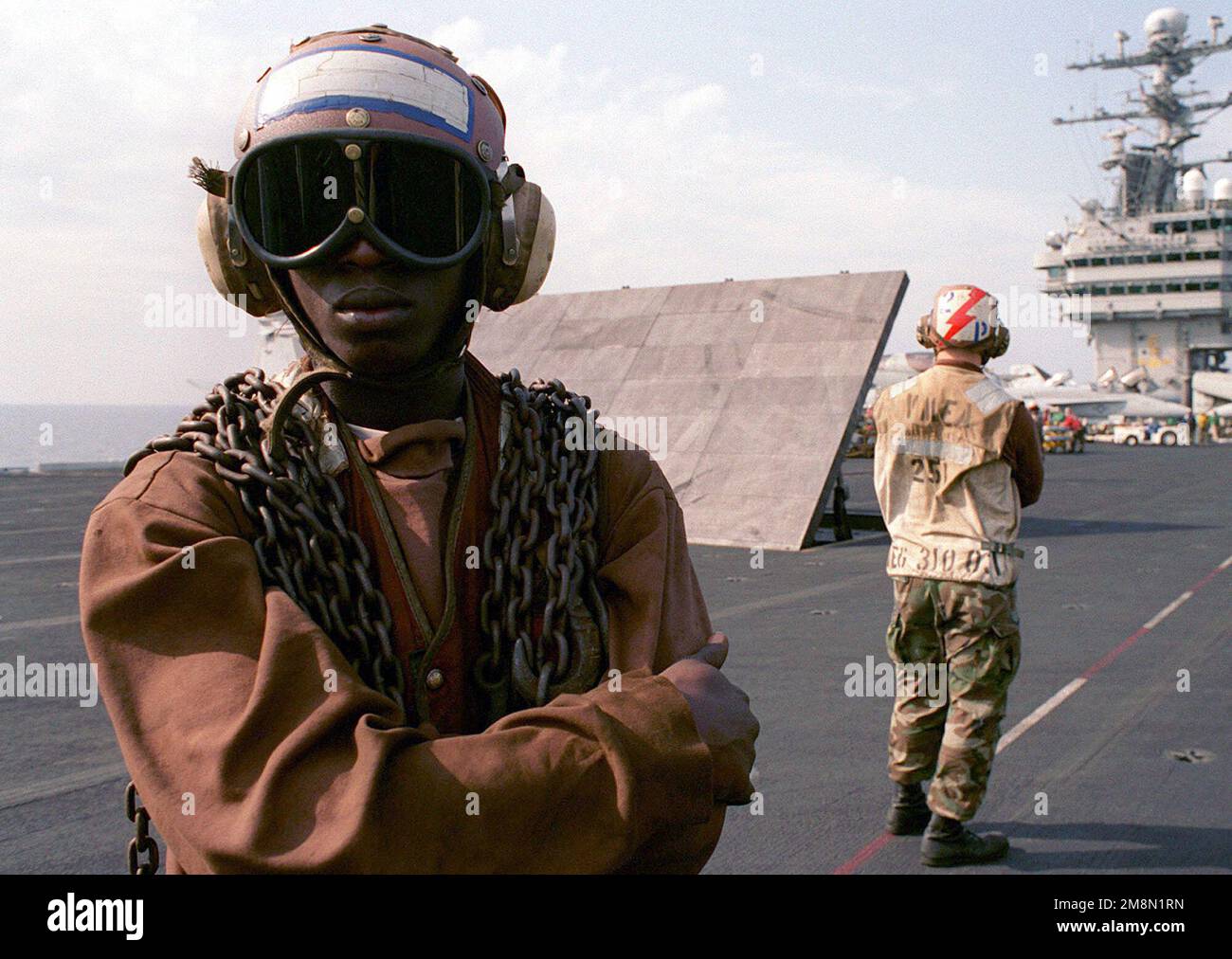 AMN Davie Shivers awaits the arrival of aircraft on USS GEORGE ...