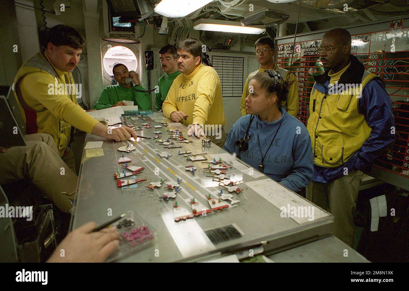 US Navy CHIEF Warrant Officer 2 Stacey Schlosser (Left), the Air ...