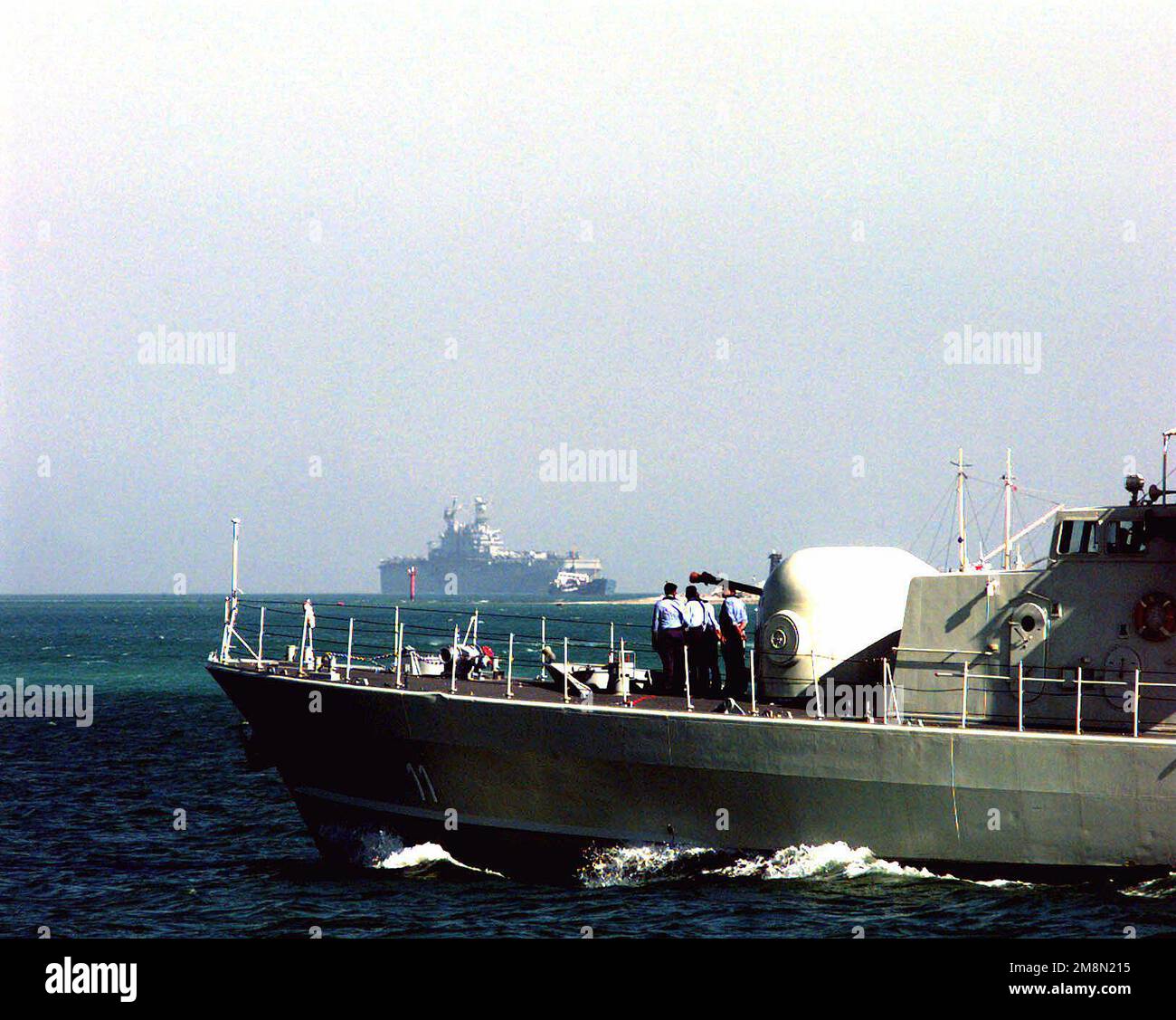 A Bahrainian, Al Riffa Class Fast Attack Craft, HAWAR (PCF 11), passes ...