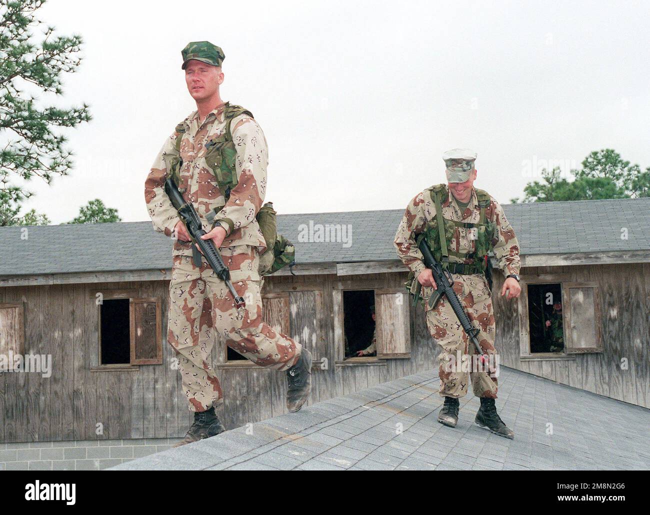 US Marine Corps Sergeant Hale and Sergeant Barr, from the 6th Marine ...
