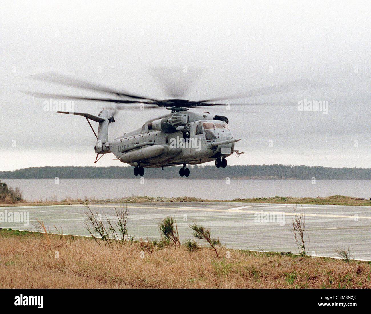 CH-53E Sea Stallion helicopter touches down on the LHA Deck to simulate ...