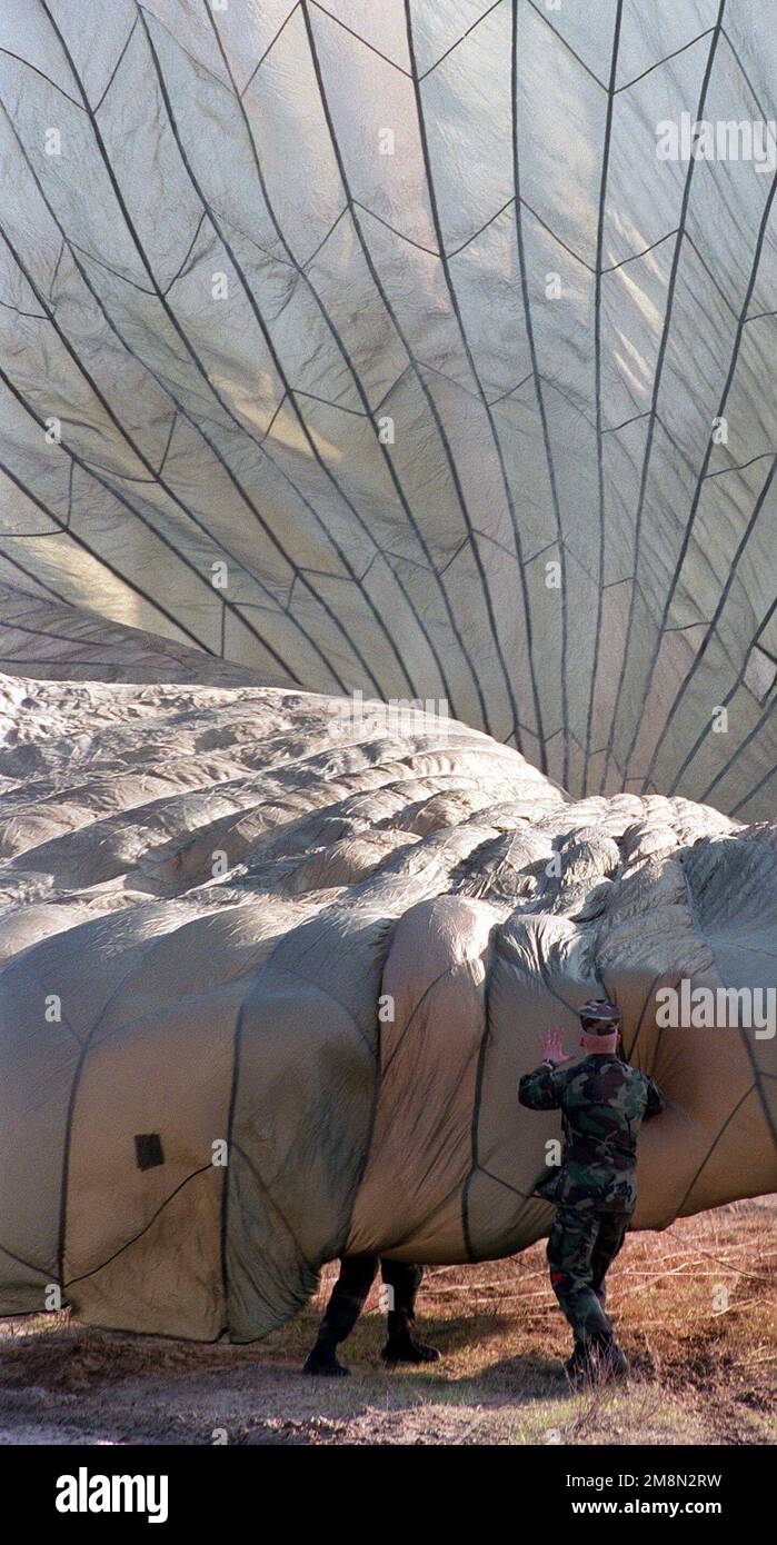Two Marines from the 2nd Landing Support Battalion pull in the ...