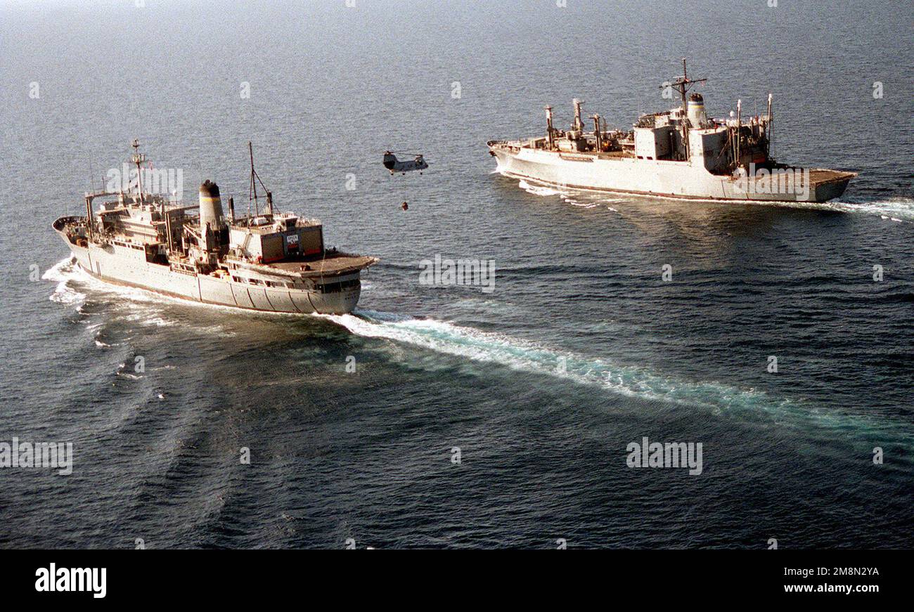 The Kilauea Class Ammunition Ship, USNS KILAUEA (T-AE 26) (Right), and ...
