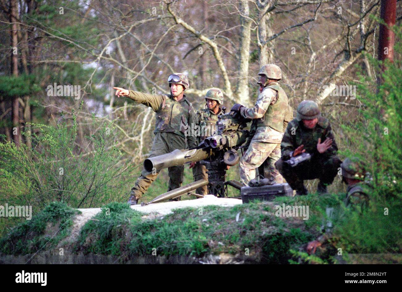 STAFF Sergeant Tooman (left), the training SNCOIC, selects a target for ...