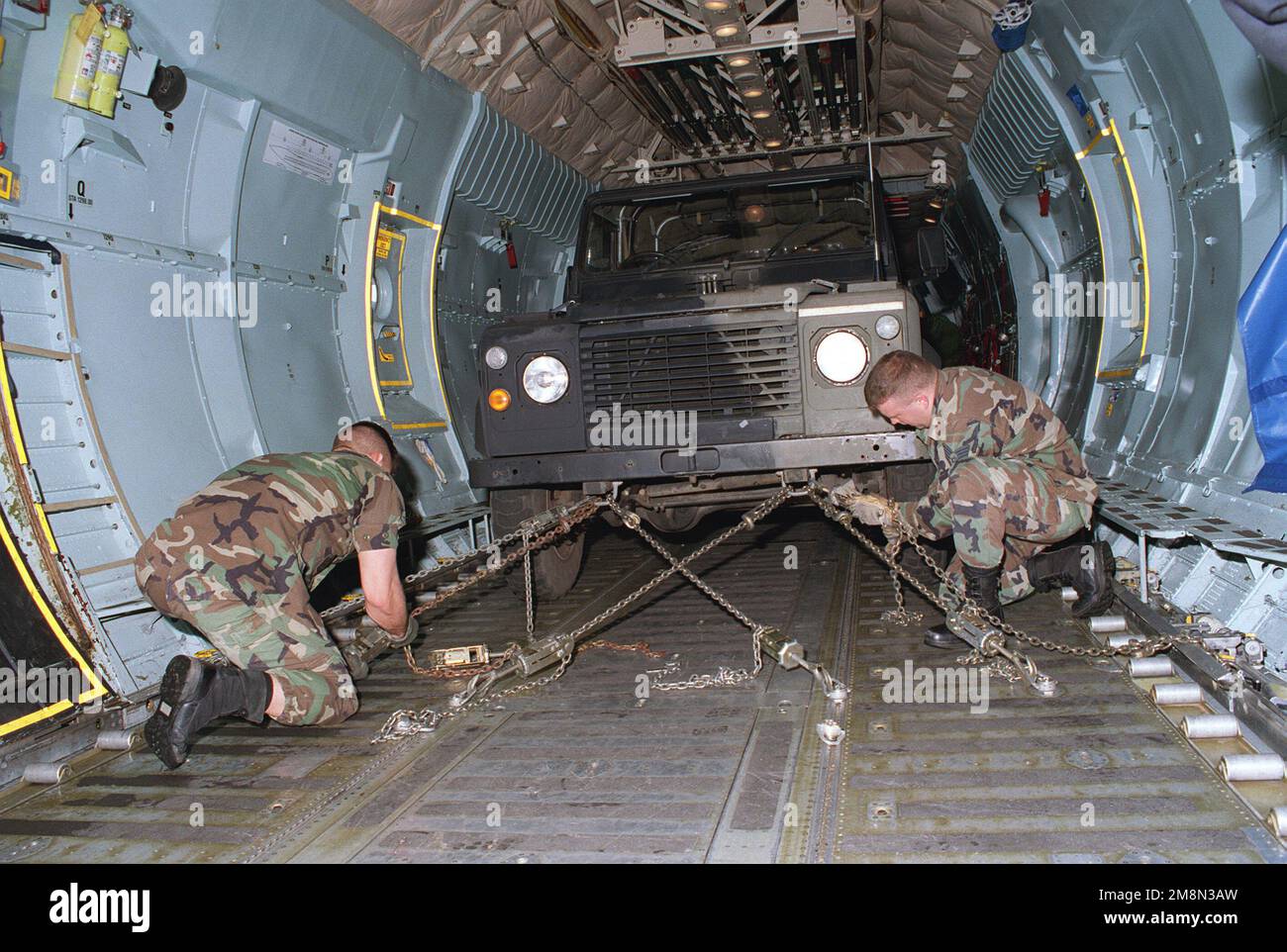 US Air Force SENIOR AIRMAN (SRA) Jason Butno (left) and STAFF Sergeant ...