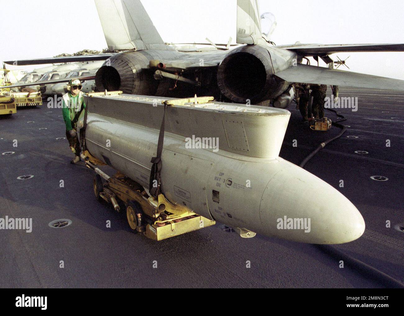 Photographer's Mate 3rd Class (PH3) Jason Stiles pulls a Tactical Air ...