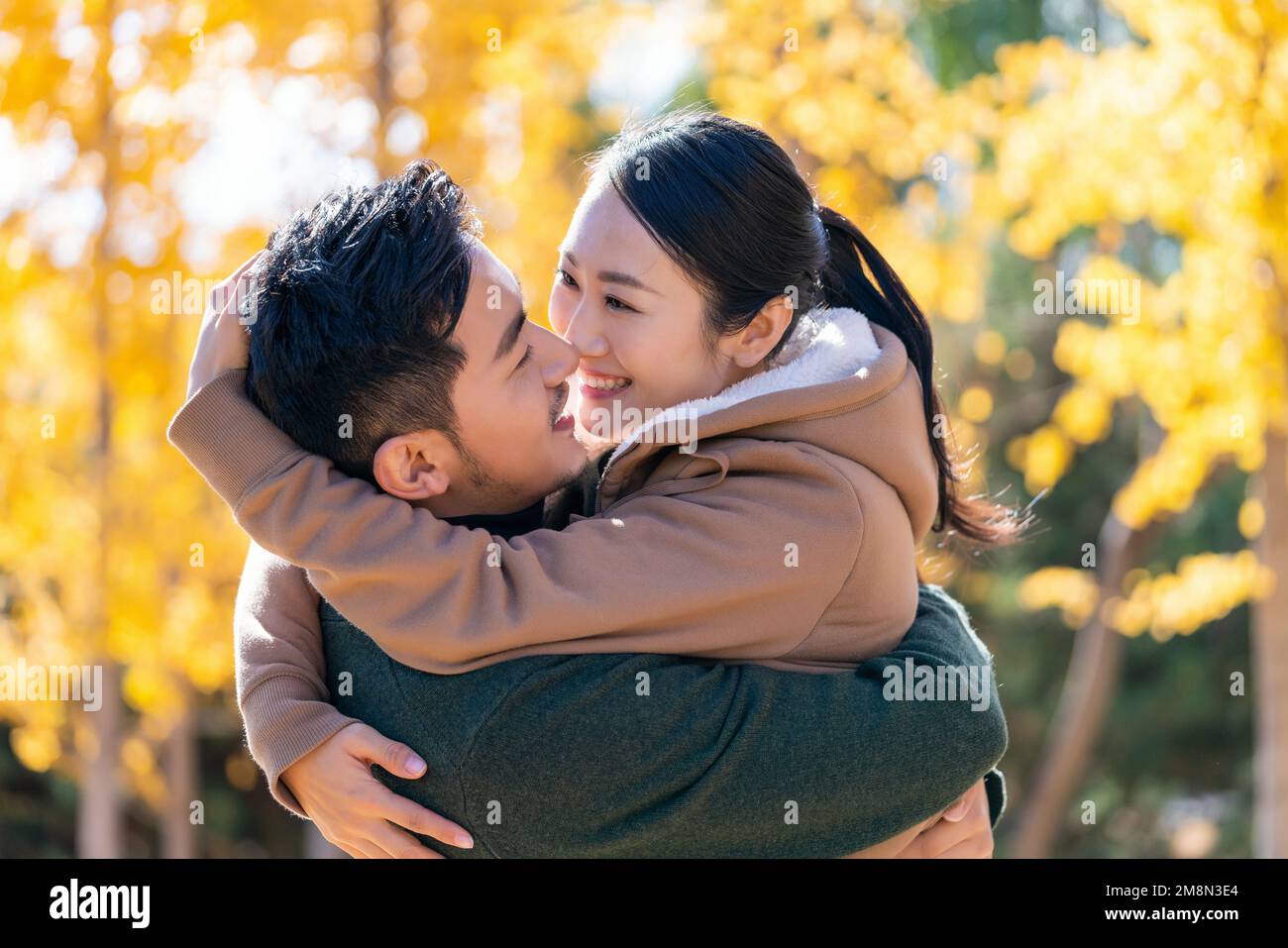 Young lovers embracing Stock Photo - Alamy