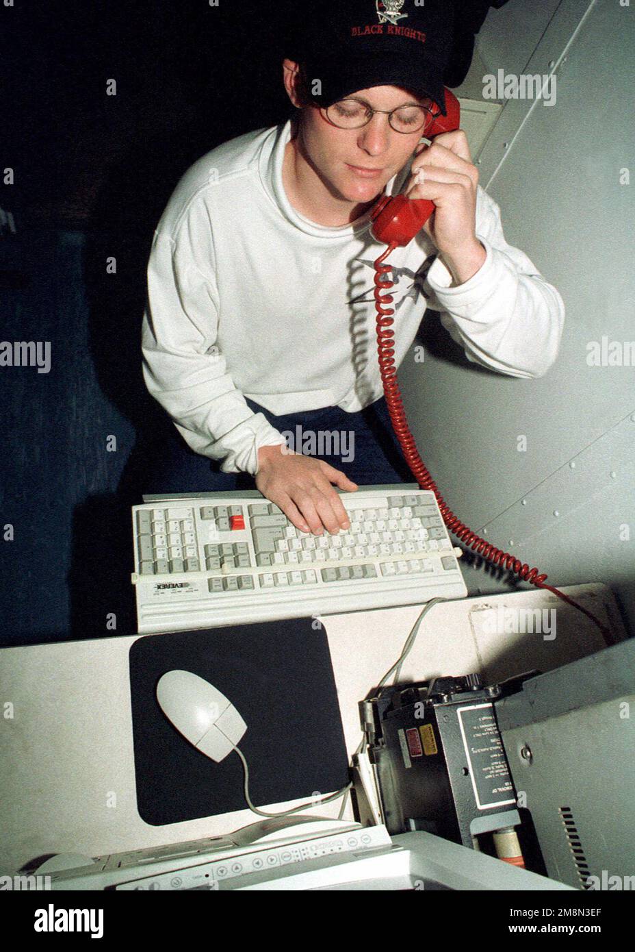 Intelligence SPECIALIST 3rd Class (IS3) Michael Cuthbertson receives a ...