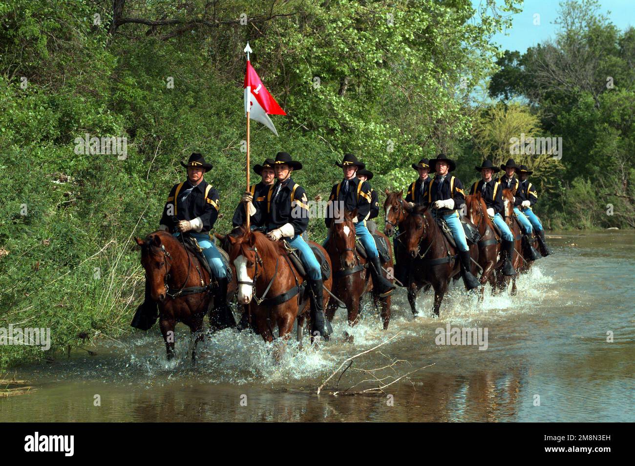 SSG Raymond Moss (right) and SGT Joseph Core (carrying unit flag) of ...