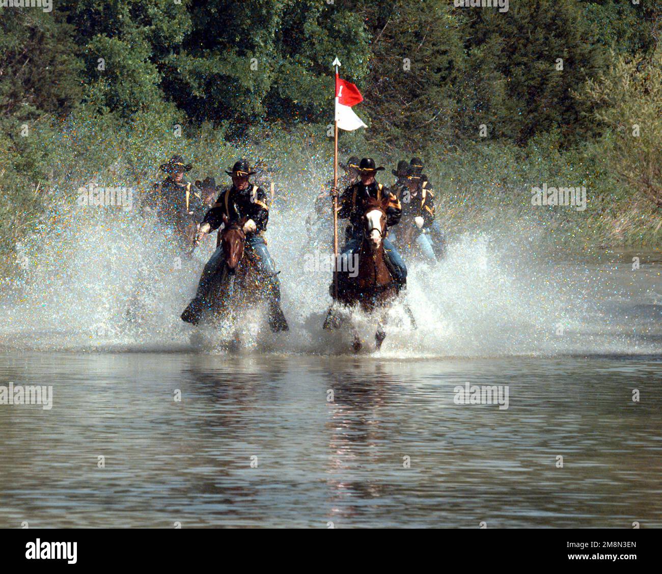 SSG Raymond Moss (right) and SGT Joseph Core (carrying unit flag) of ...