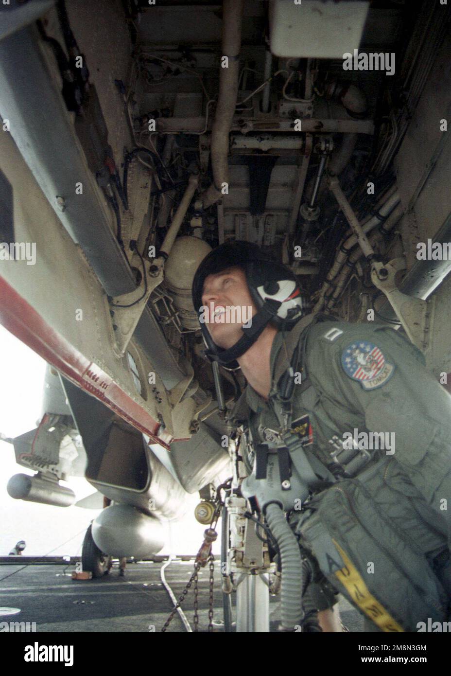 US Navy Lieutenant (LT) Chris Adams conducts a preflight safety ...