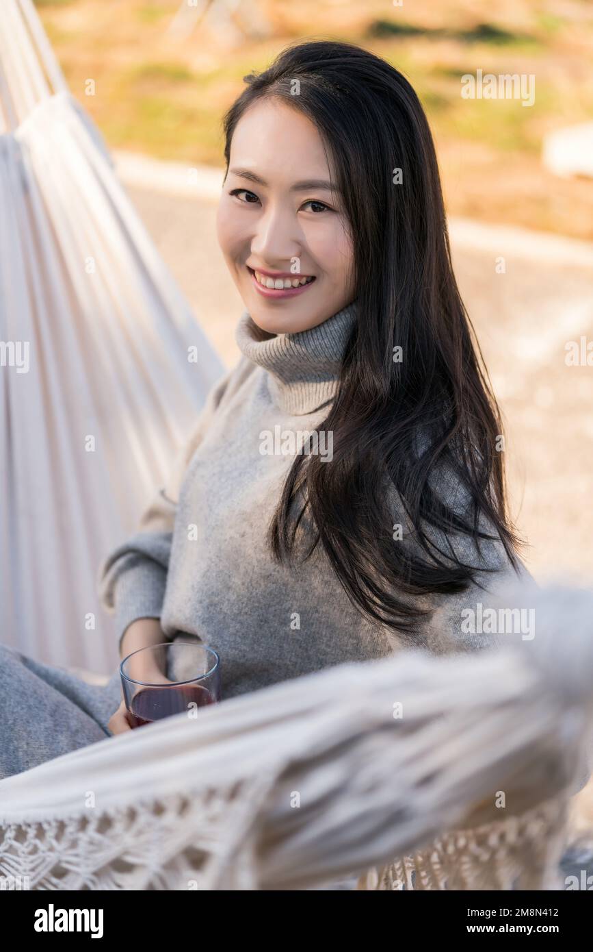 Hammock woman wine hi-res stock photography and images - Alamy