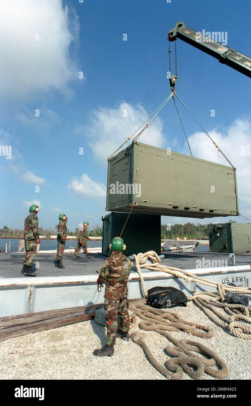 Marines from Second Landing Support Battallion load connex boxes ...