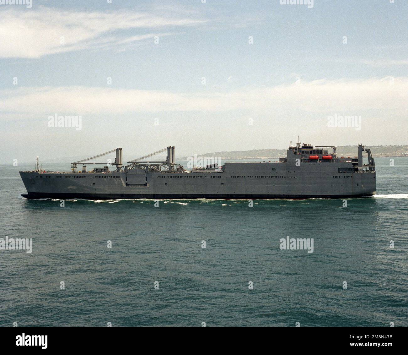 A port beam view of the Military Sealift Command (MSC) strategic heavy lift ship USNS WATSON (T ...
