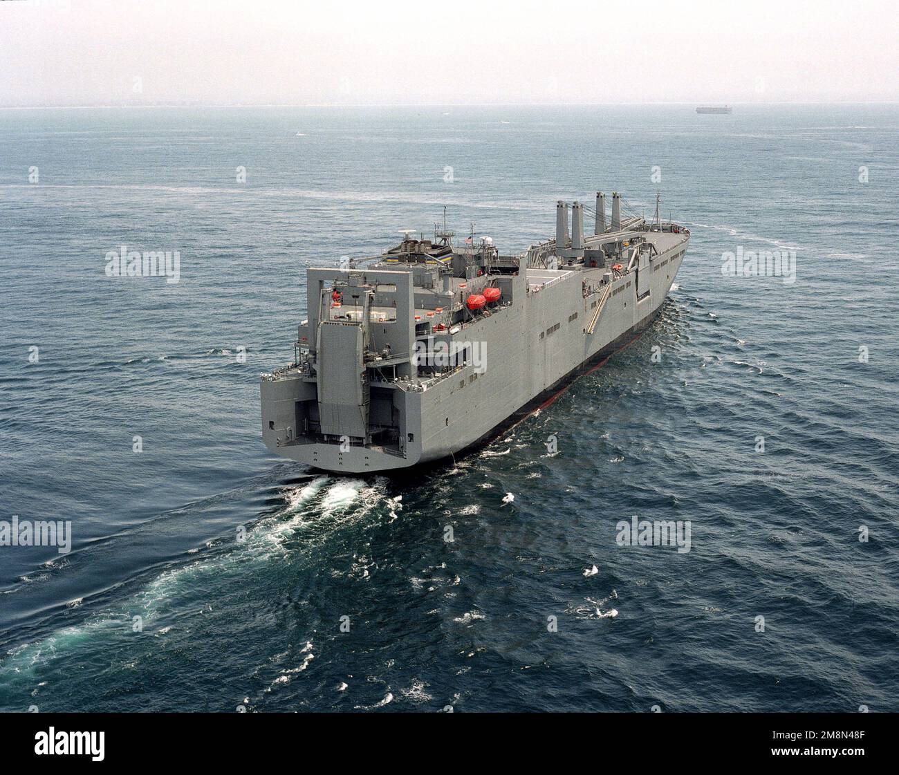 A low oblique aerial starboard quarter view of the Military Sealift Command (MSC) strategic ...