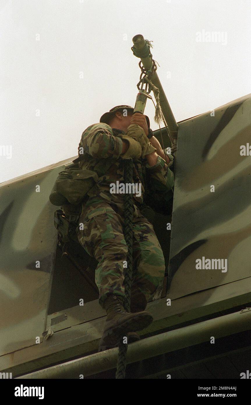 A Marine prepares to repel from a tower during Exercise COBRA GOLD '98 ...