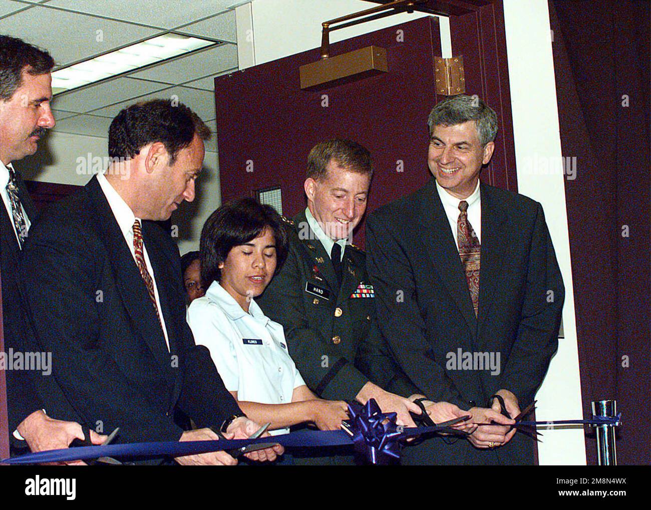 Ribbon cutting ceremony at the grand opening of the new Defense ...