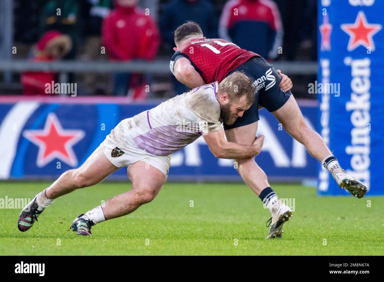 Limerick, Ireland. 15th Jan, 2023. Calvin Nash of Munster tackled by ...