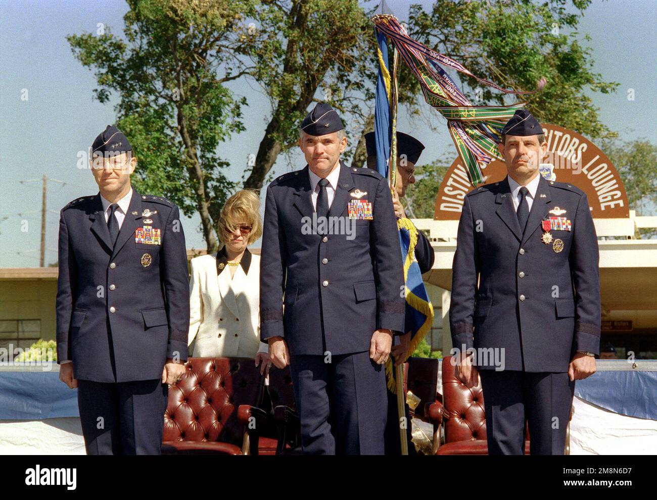 Medium shot, front view, Change of Command ceremony, reviewing stand ...