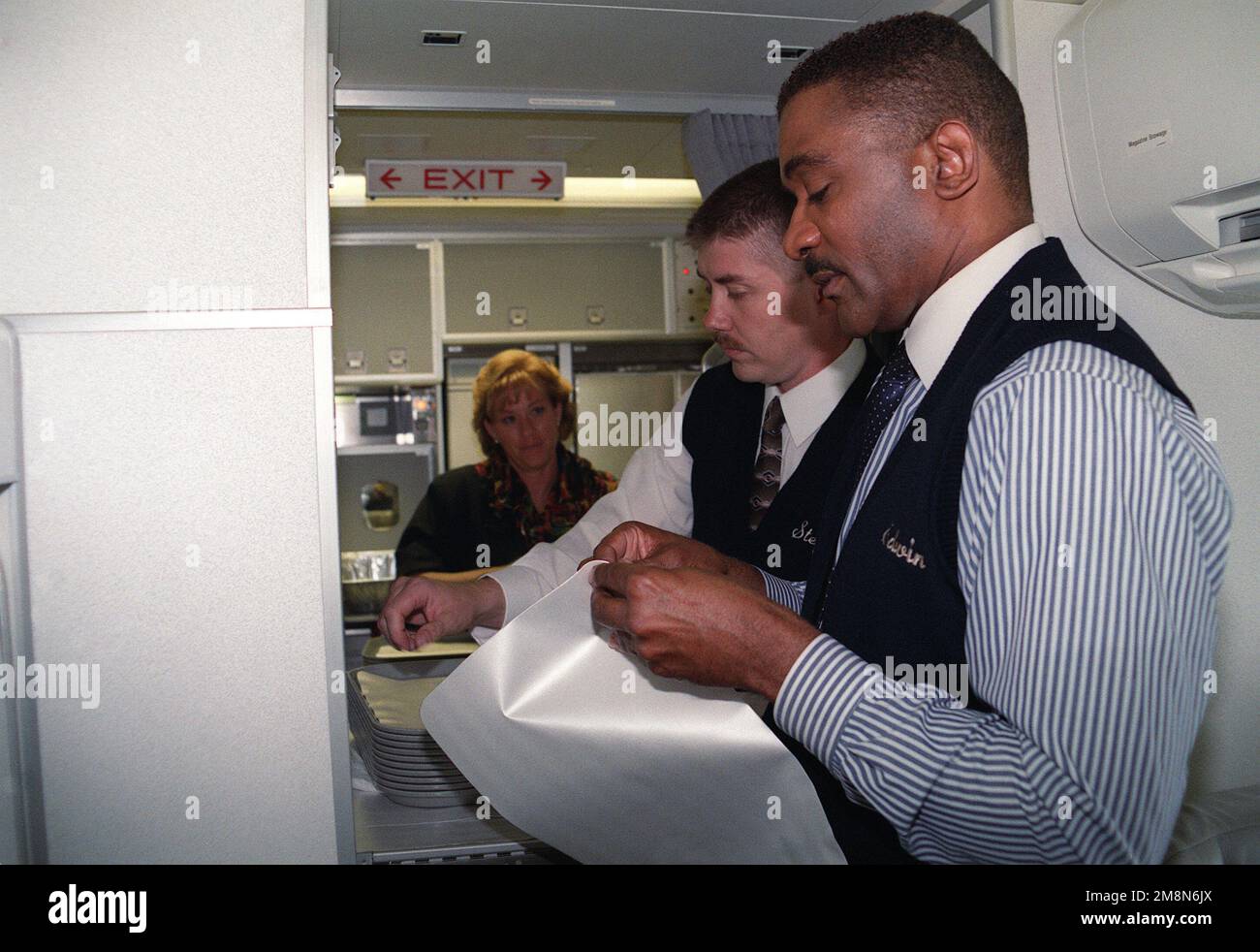 STAFF Sergeant (SSGT) Irwin Dennis, USAF, (left), SSGT Stephen Johnson, USAF (center), and ...