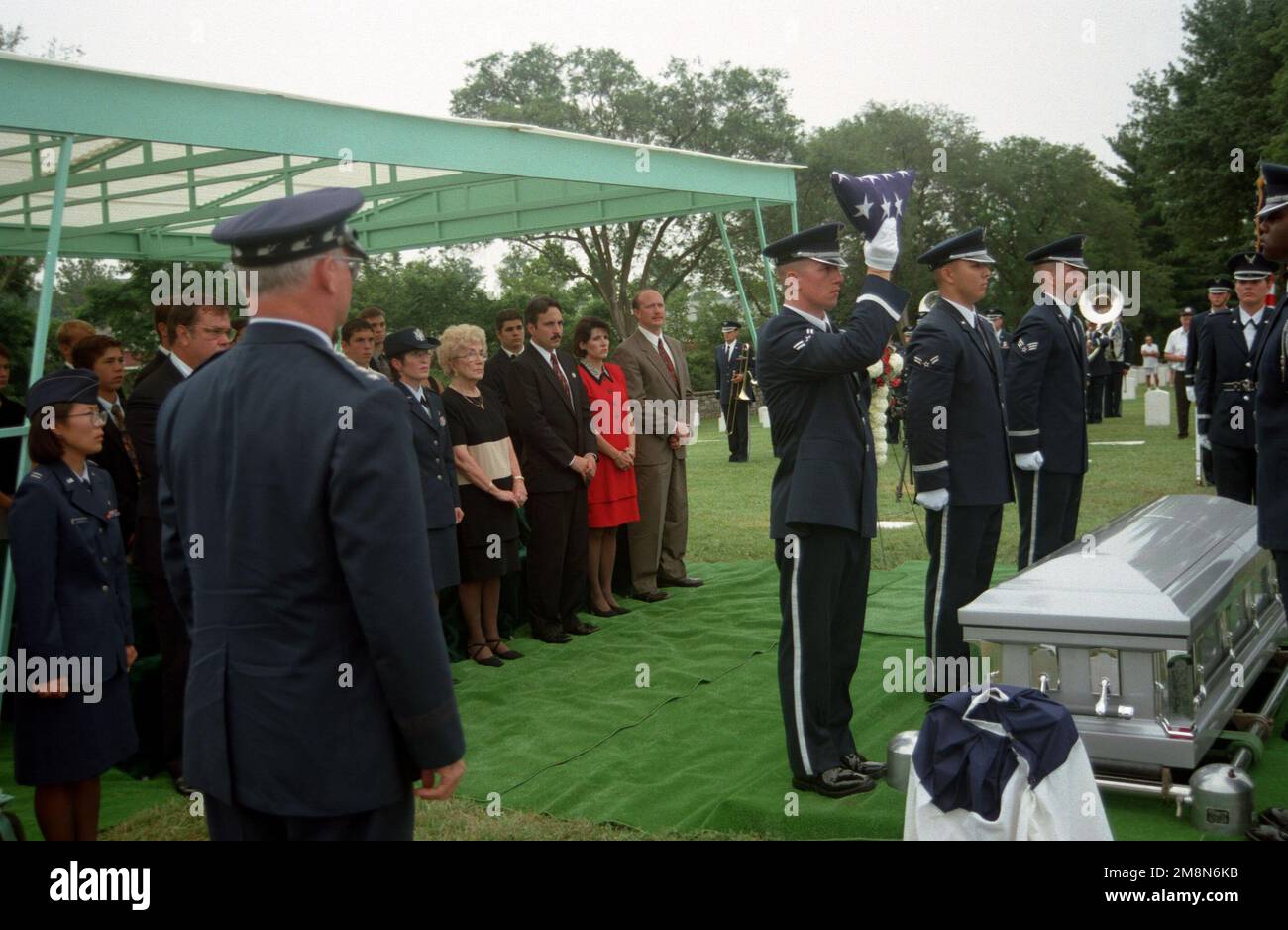 During the funeral service at Jefferson Barracks National Cemetery a ...
