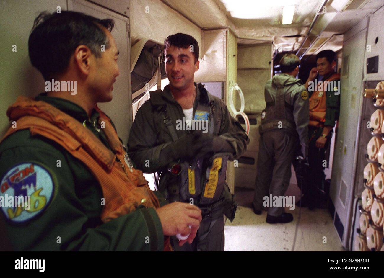 Crewman AD2 (NAC) Anthony Corcoran (second from left) and AE2 (NAC ...