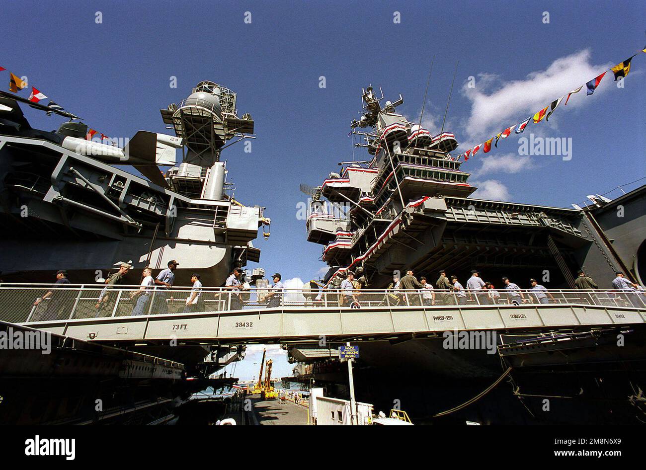 Looking like a busy street in a major city, officers and enlisted ...