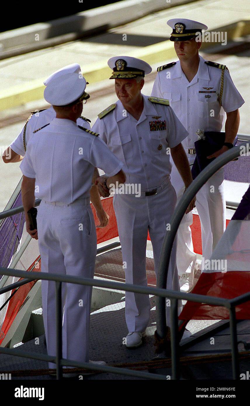 RDML Timothy J. Keating, (center), Commander, Carrier Group Five, is ...