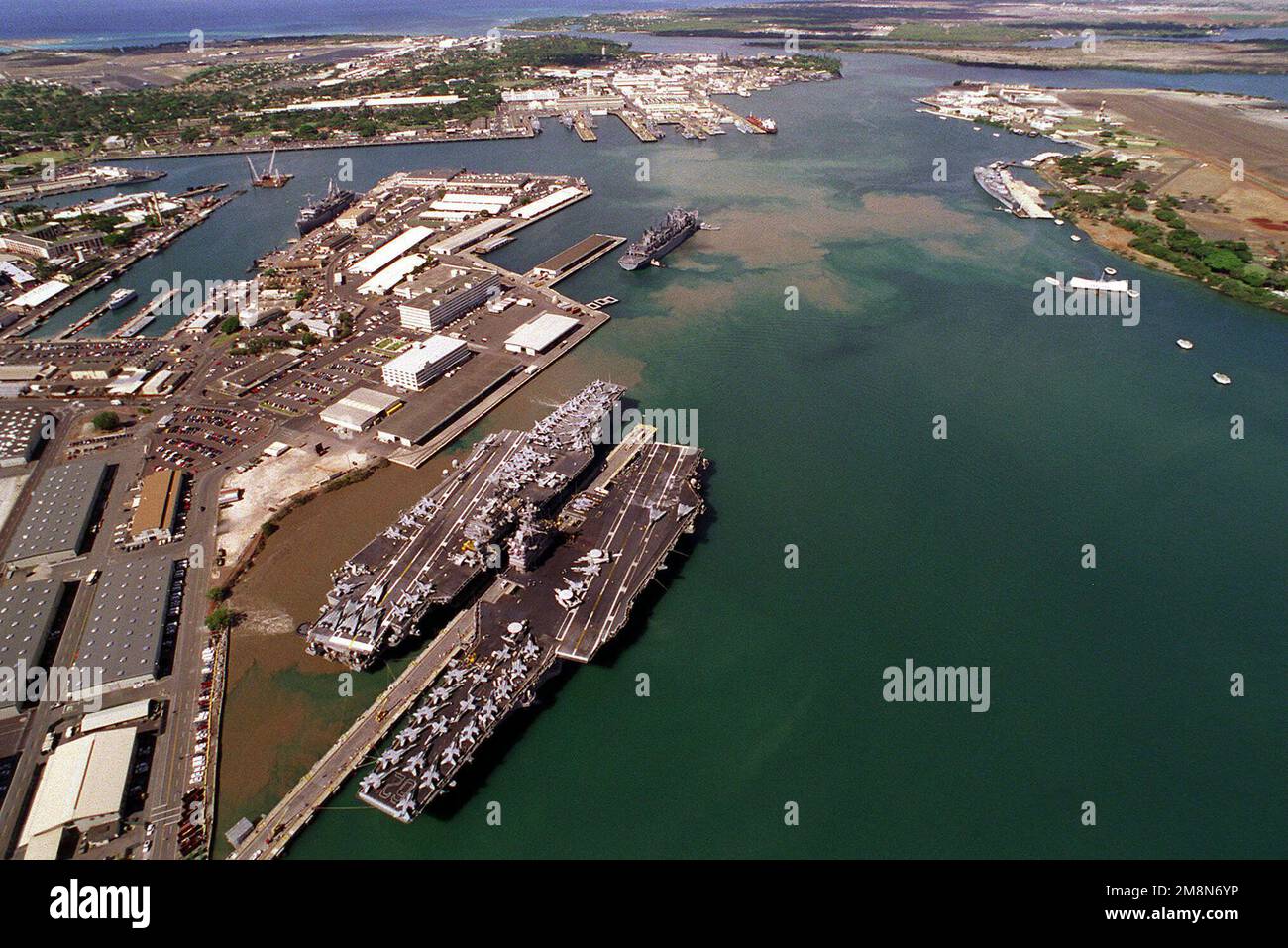 An aerial view showing part of Naval Station Pearl Harbor with the ...