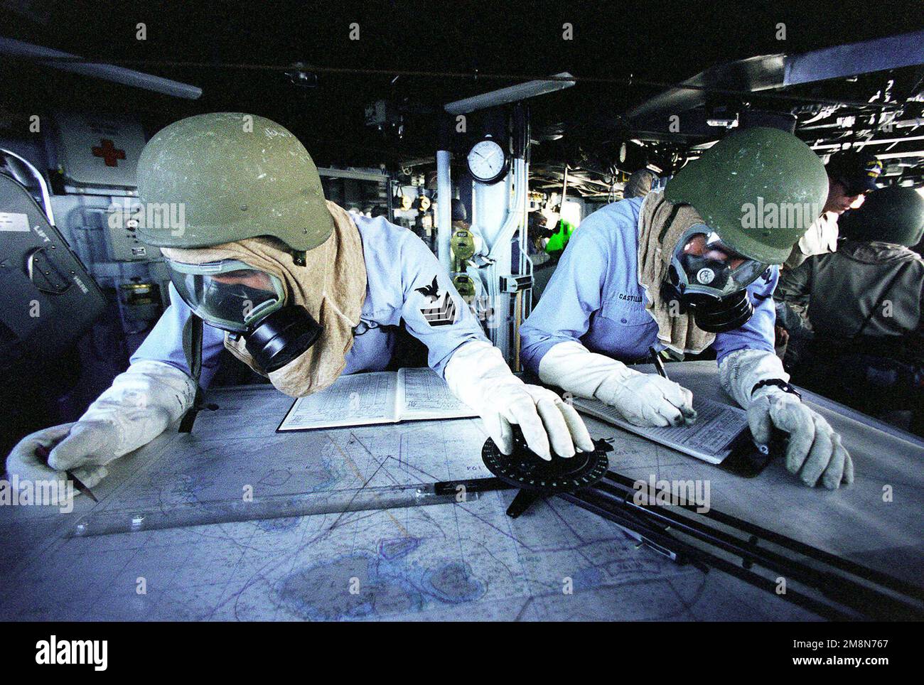 QM1 Michael Broekhof (left) and QM3 Osiris Castillo (right), wearing ...