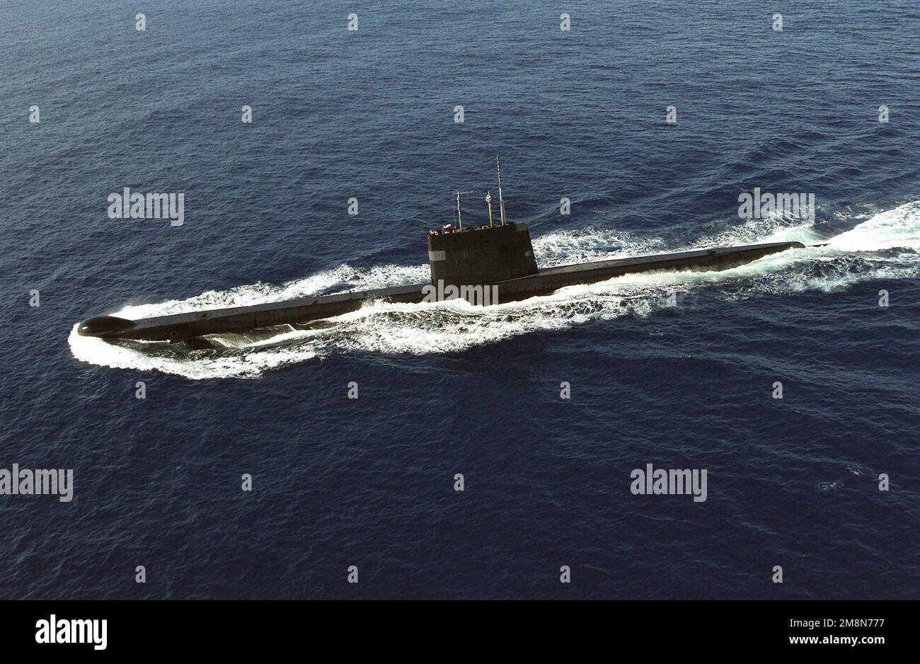 Port beam view of the Australian Navy submarine HMAS ONSLOW (SS-60) as ...