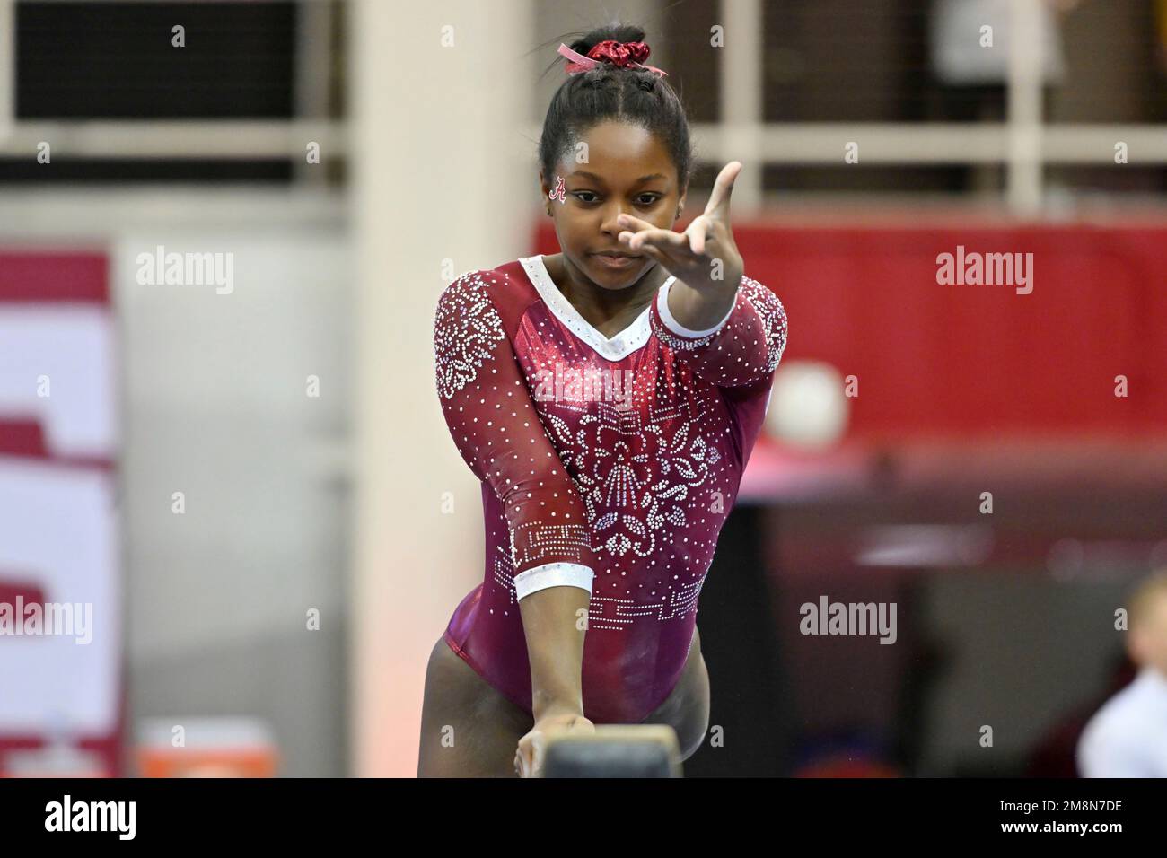 Alabama gymnast Lillian Lewis competes on the beam against Arkansas ...