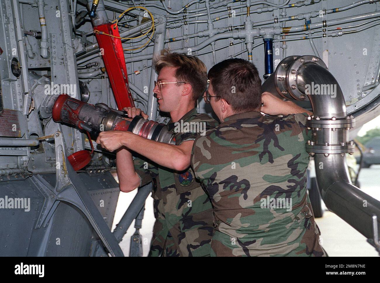 Suffolk County, England. USAF AIRMAN Karcz (background) and SENIOR ...