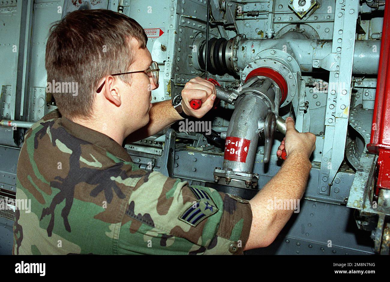 Suffolk County, England. USAF SENIOR AIRMAN Wilson, assigned to 100th ...