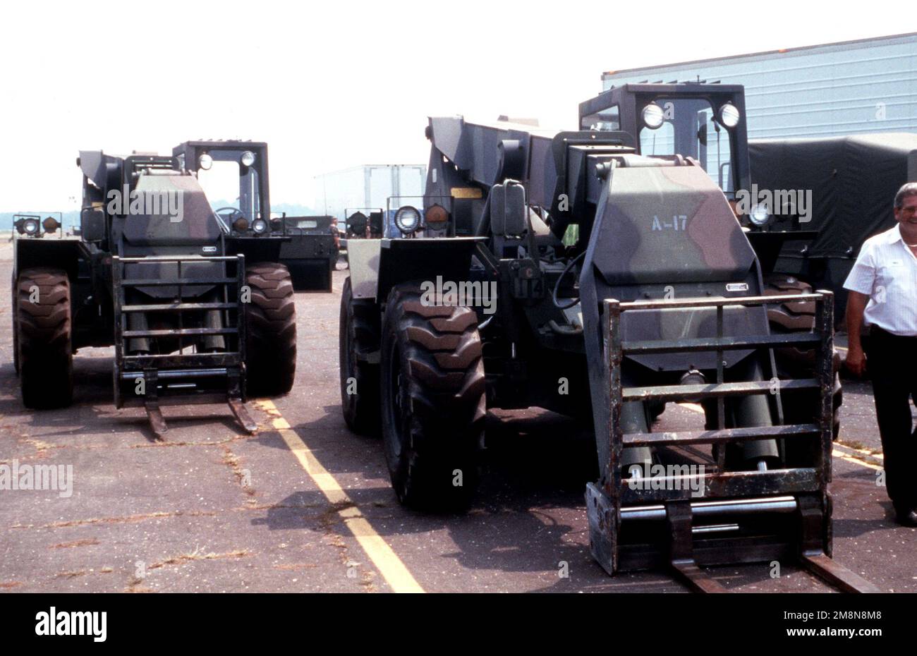 A front view of two TRAK All-Terrain Lifter Army System (ATLAS) parked ...