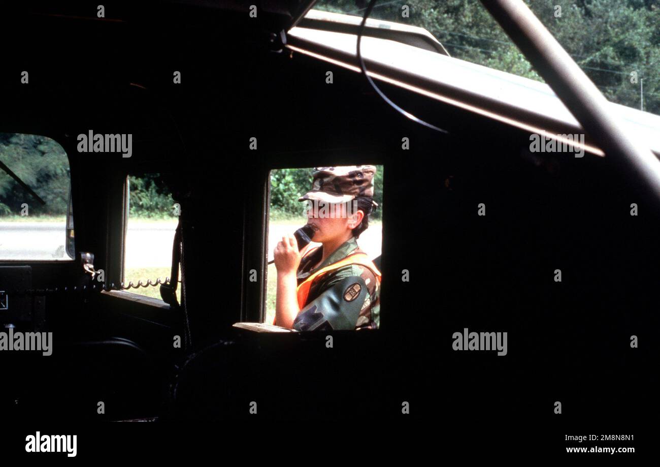 Photographed through the window of her M1114 Heavy High-Mobility ...