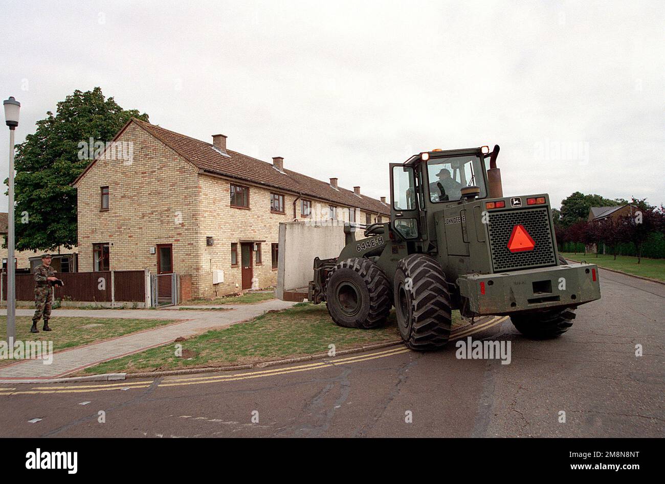 Suffolk County, England. A USAF AIRMAN from the 100th Civil Engineering ...
